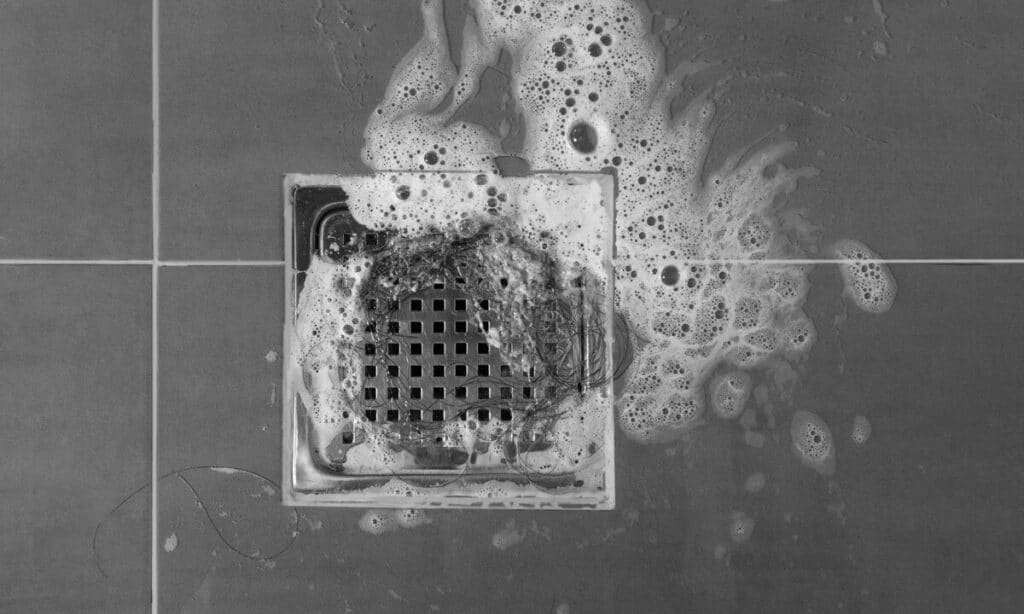 Why Does My Shower Drain Smell Funny? - Mainstream Electric